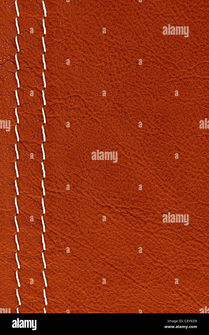 Leather background in brown with white stitches Stock Photo - Alamy