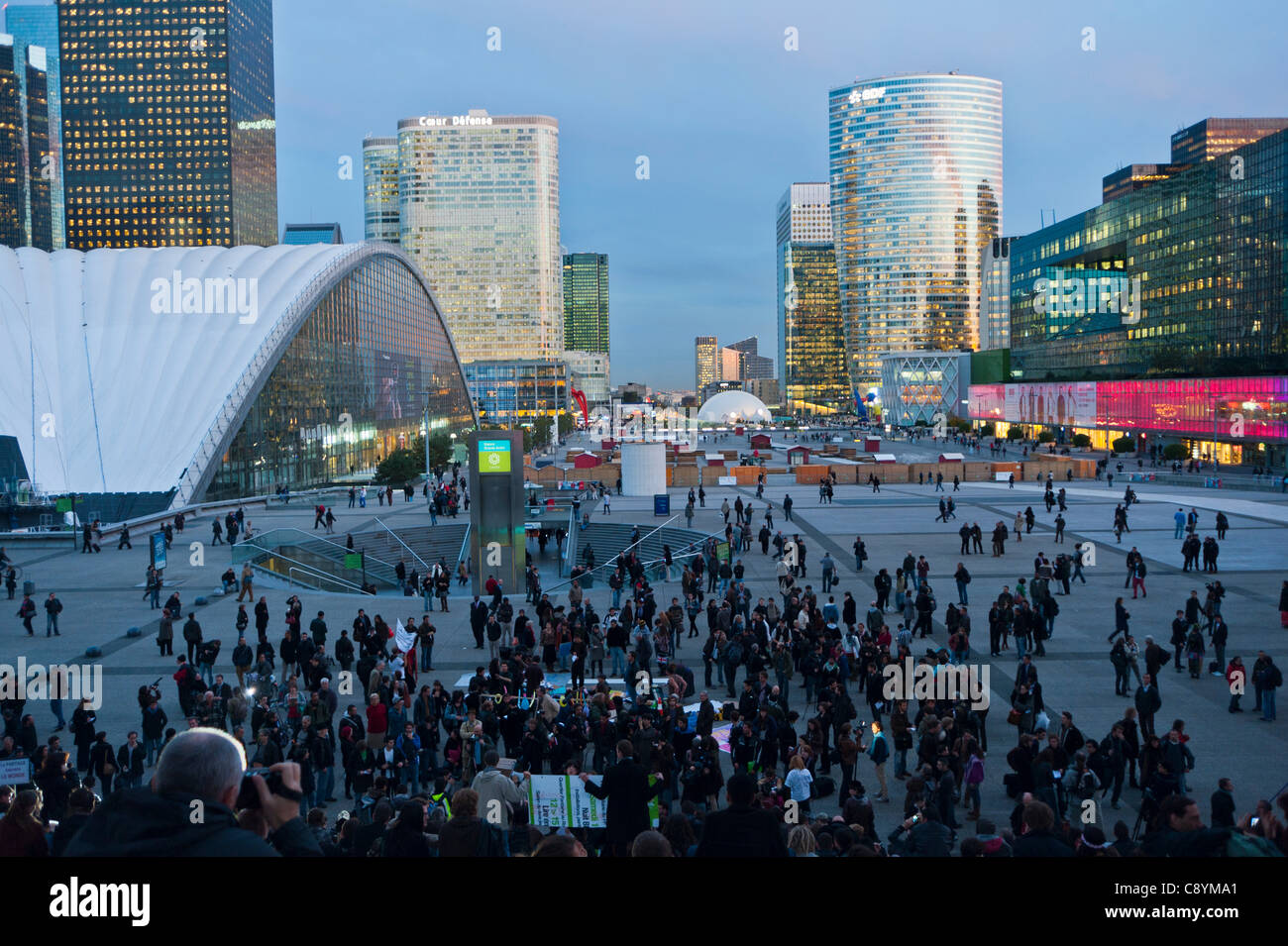 Paris, France, La Defense, crowd from behind, Business District at Dusk ...