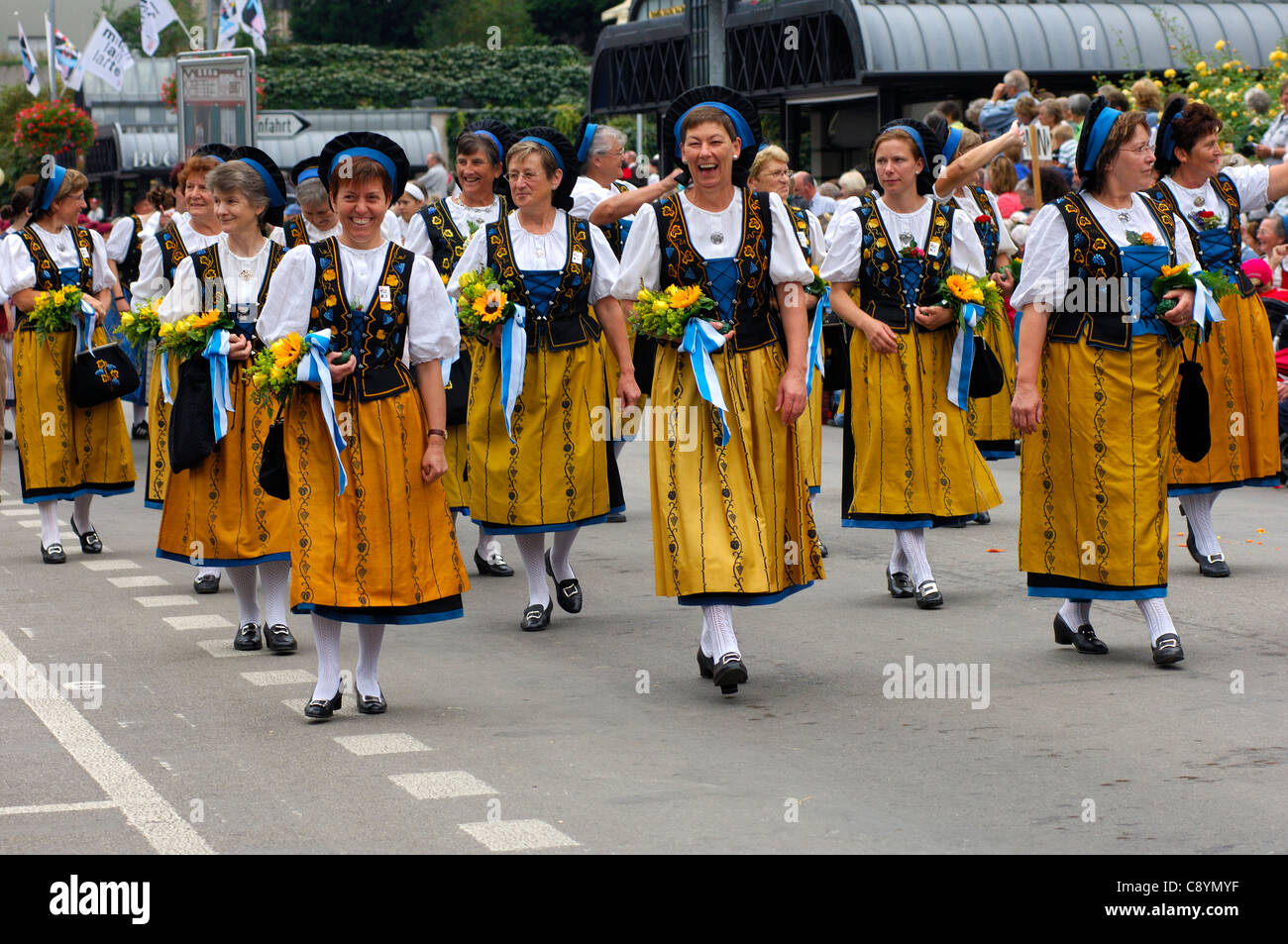 Group of Swiss women in dirndl dresses at the festival Unspunnenfest ...