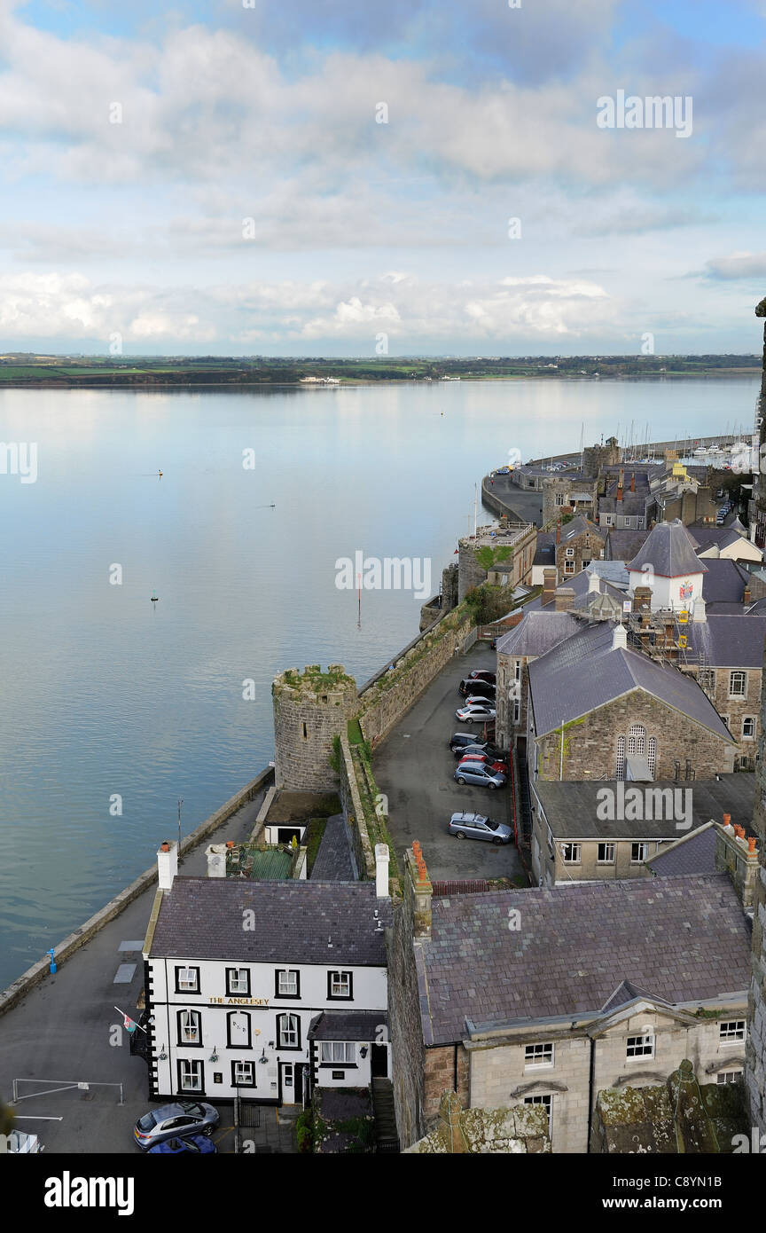 view of the anglesey pub/hotel and menai strait from caernarfon castle ...