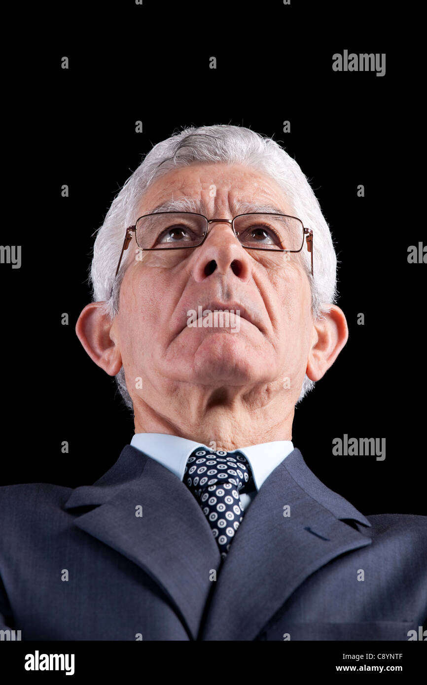 Powerful businessman portrait (isolated on black Stock Photo - Alamy