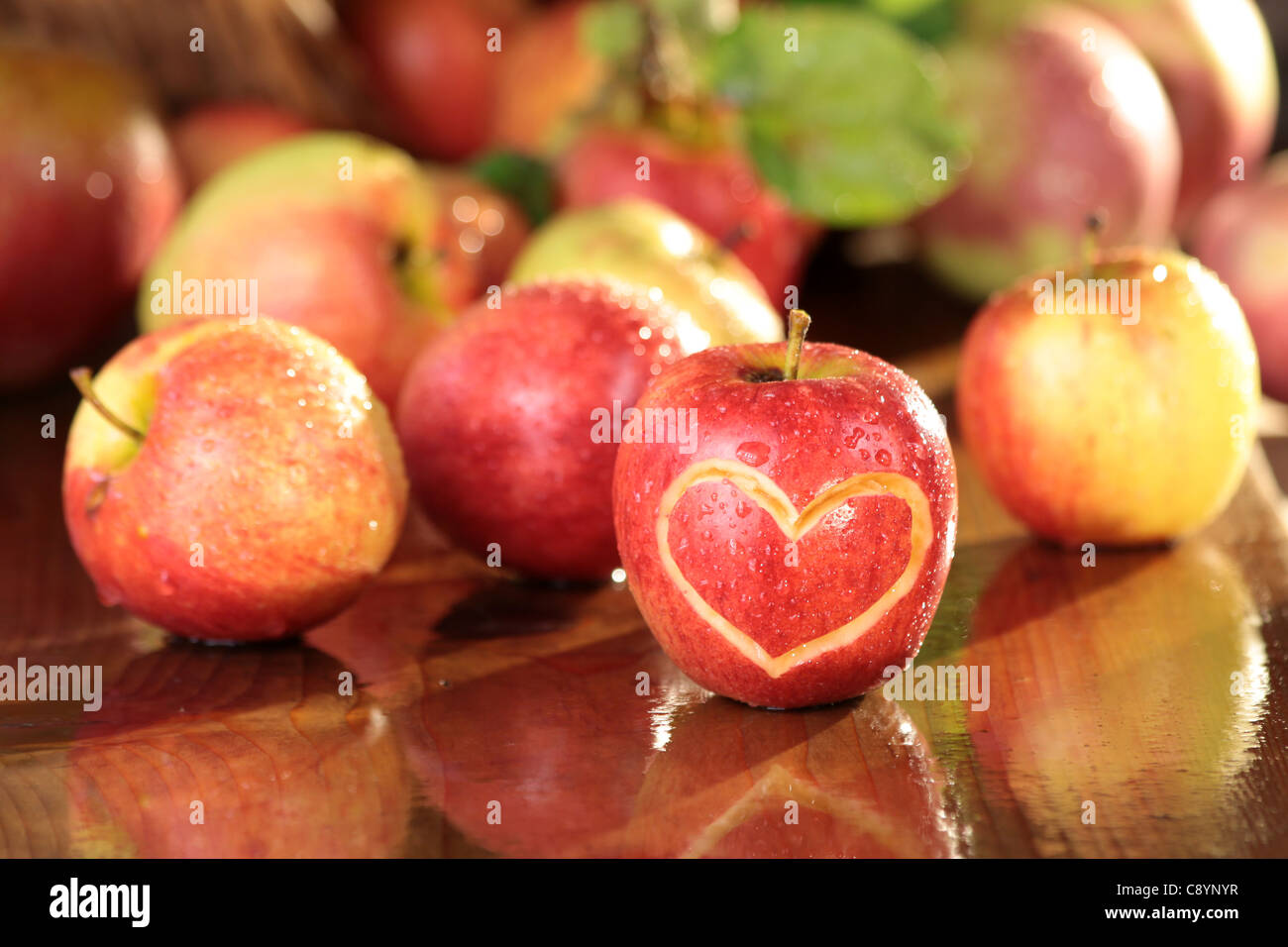 Red apple and red heart hi-res stock photography and images - Alamy
