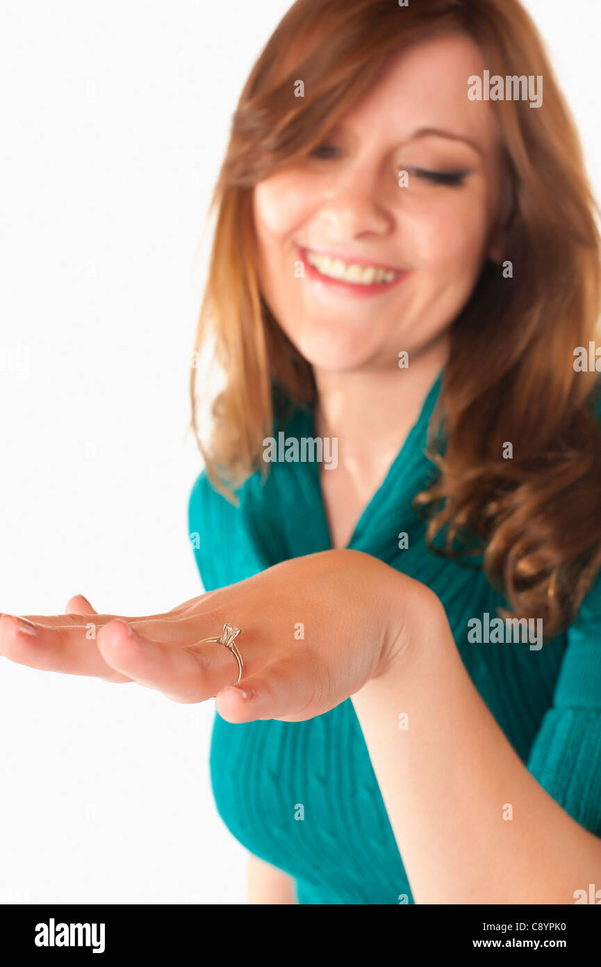 Woman showing her engagement ring Stock Photo - Alamy