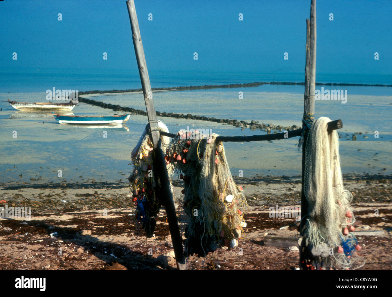 Old Gulf Coast scene with fishing nets and a fish-trap, 1975 Qatar ...