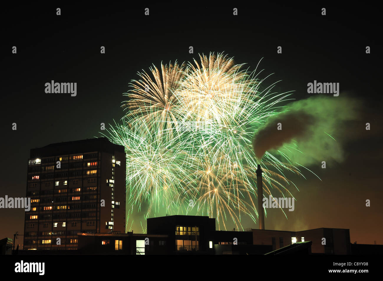 Fireworks explode over Glasgow Green, Glasgow, UK,with Gorbals flats ...
