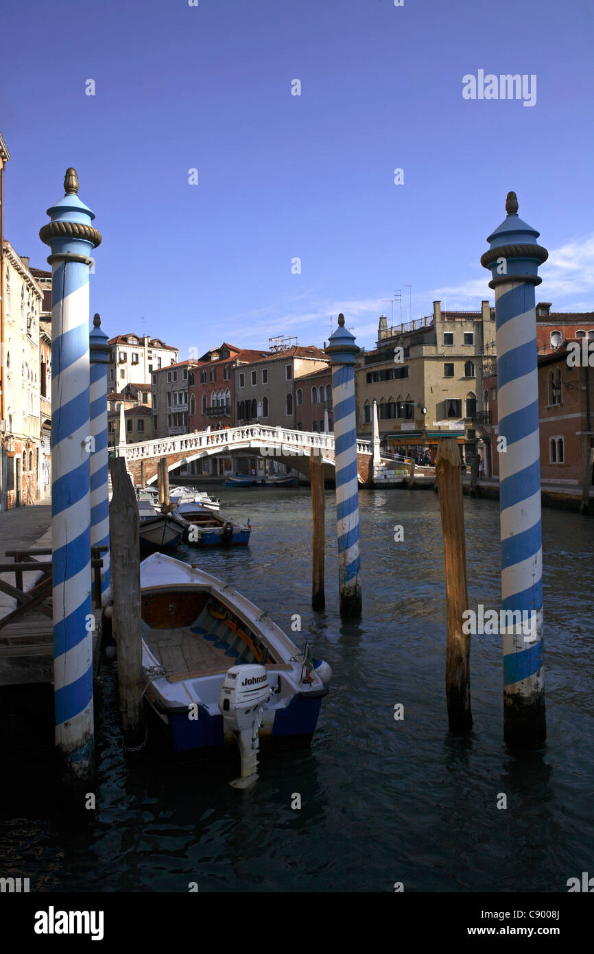 Blue and White Boat Mooring Posts and the Bridge of Canal of Cannaregio ...