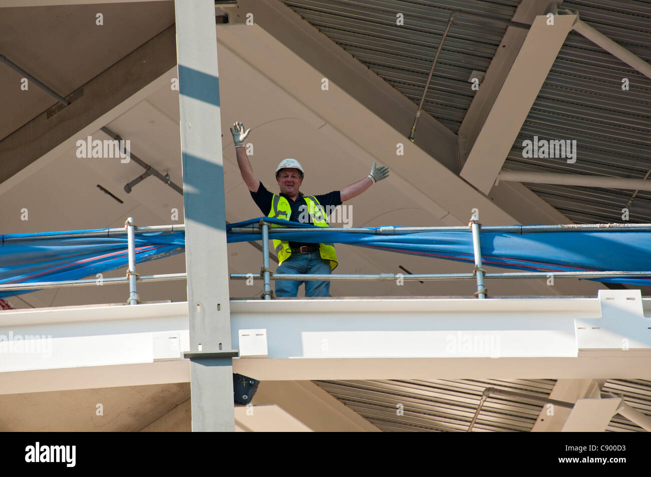 Happy workman at the new Co-Operative Society headquarters at the NOMA ...