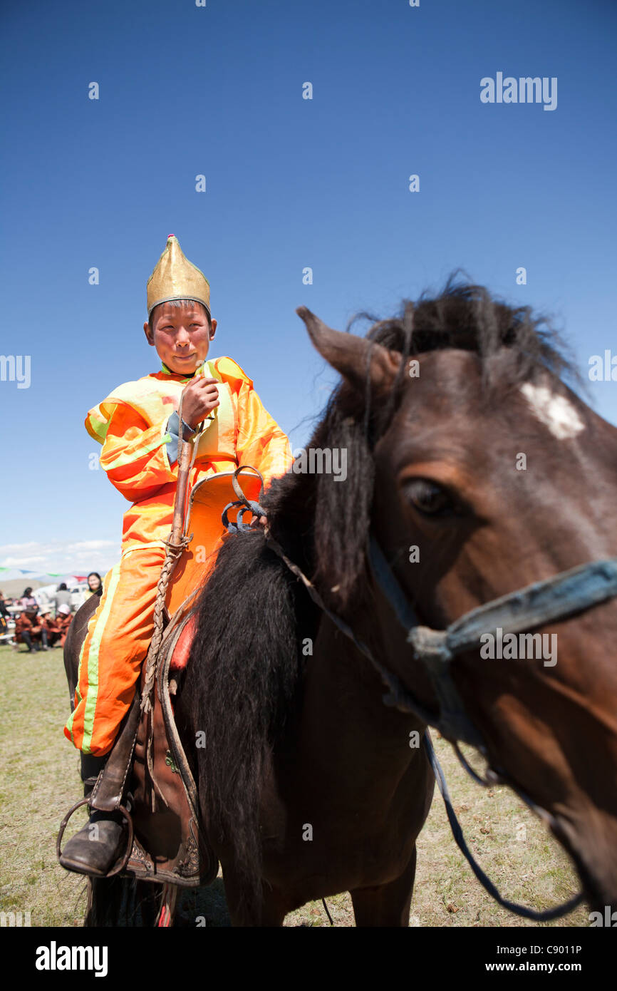 Mongolian boy get prize on Naadam festival horse racing, Tsagaannuur ...