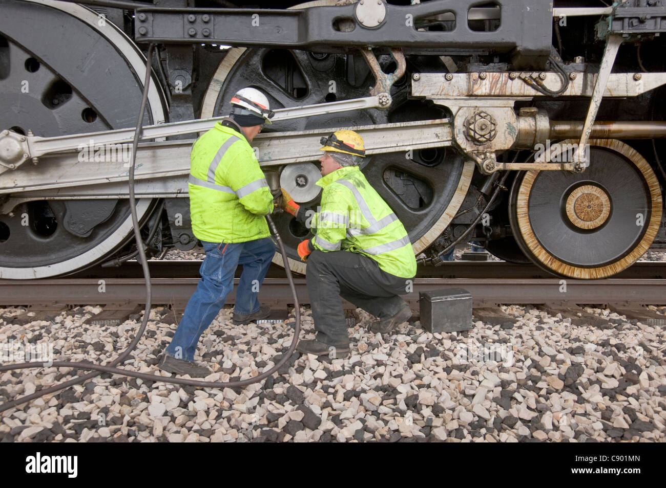 Union Pacific train crewmen oil the massive 80 inch (2,032 mm) driver ...