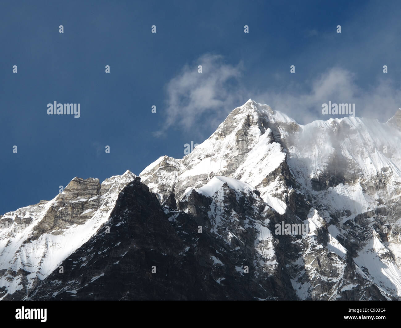 Snow capped mountain in the Himalayas Stock Photo - Alamy