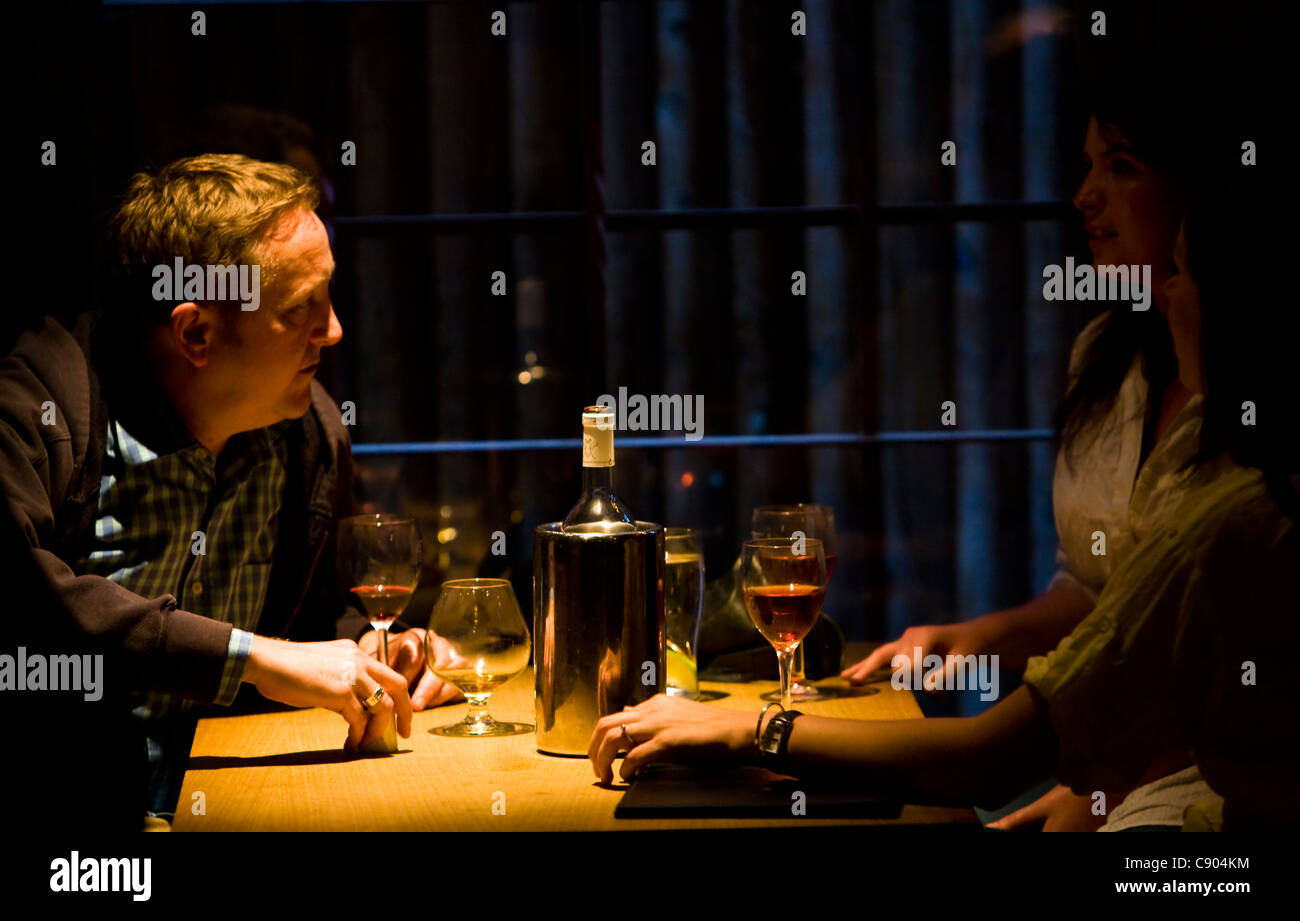 People chatting over drinks Stock Photo - Alamy