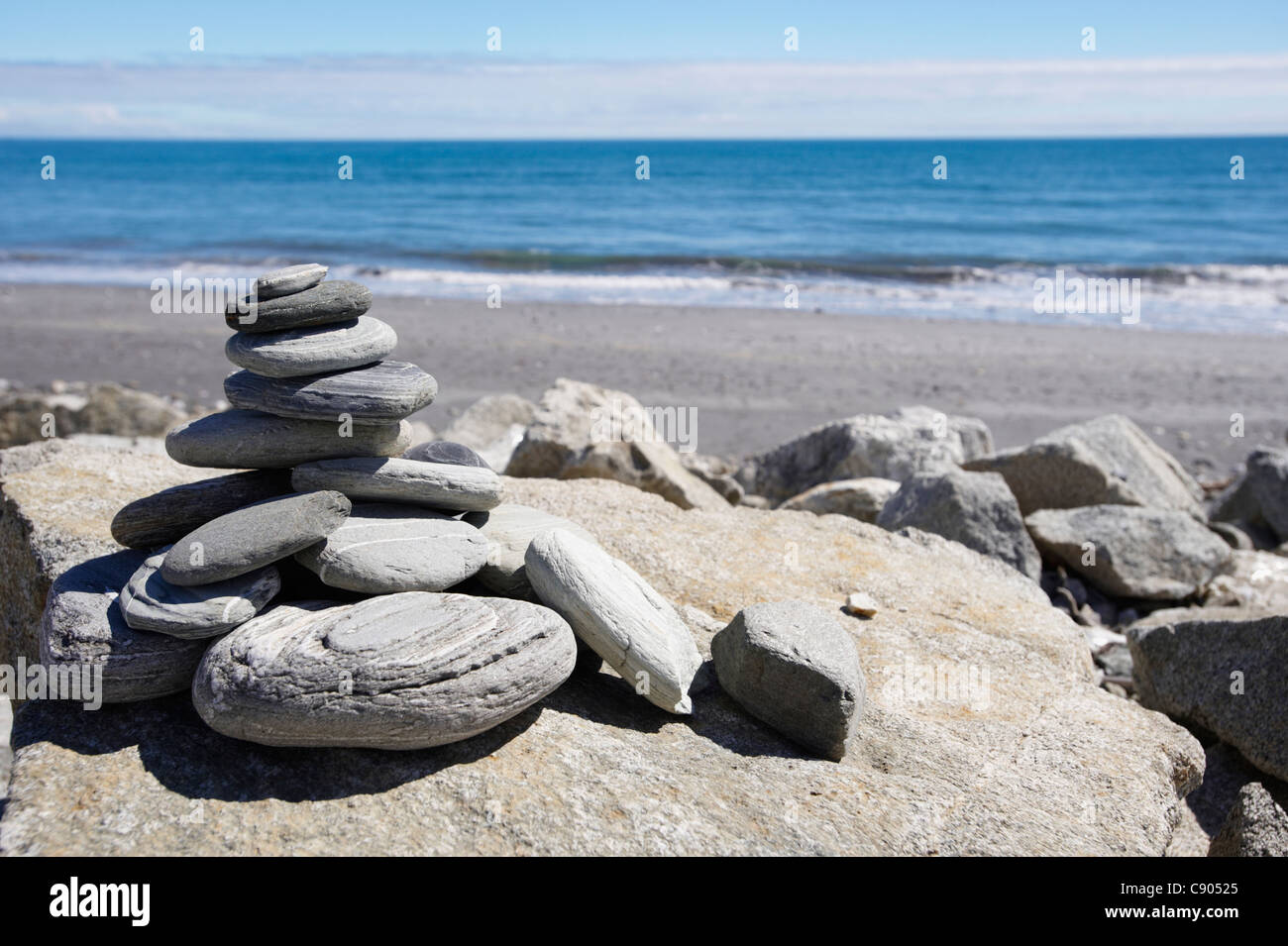 Stacked pebbles at Byron Bay, South Island, New Zealand Stock Photo - Alamy
