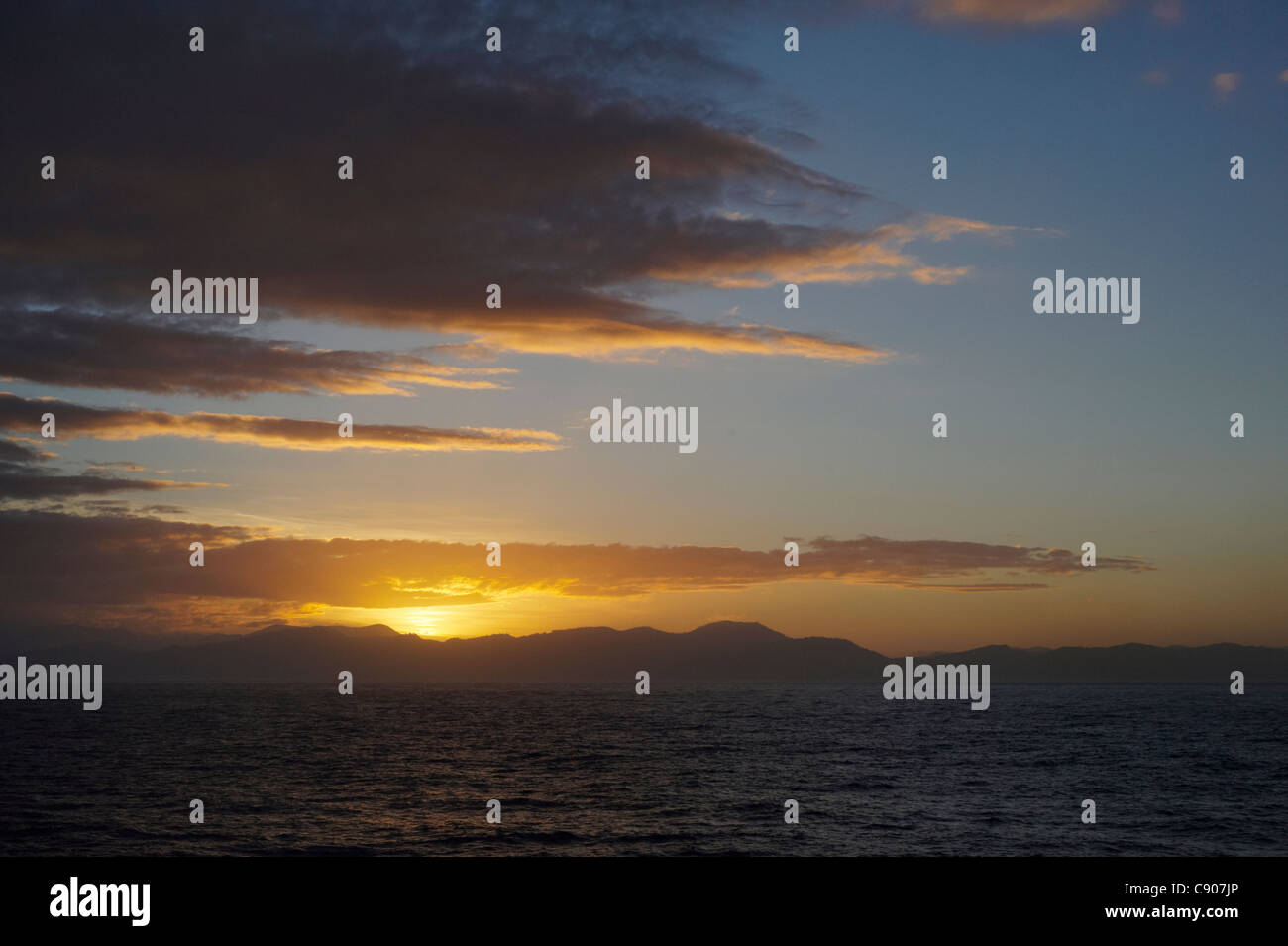 Sunset over South Island Marlborough Sounds from Cook Strait, New ...