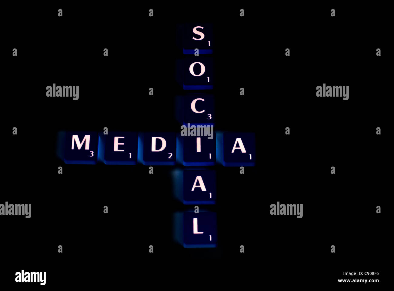 Inverted Scrabble tiles spelling out the words social media Stock Photo ...