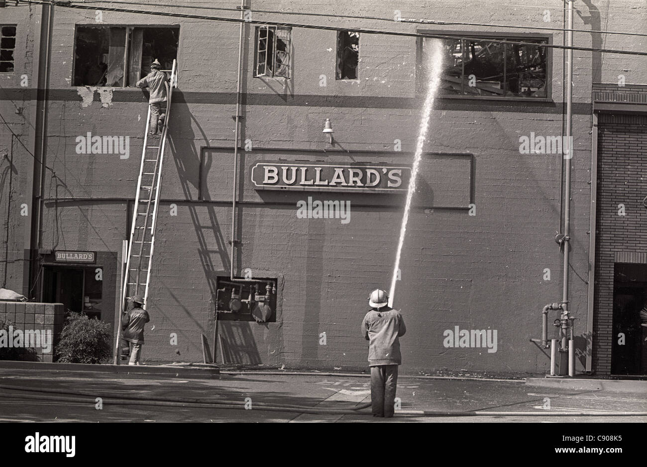 firefighters after all night fire which destroyed the bank of sierra ...