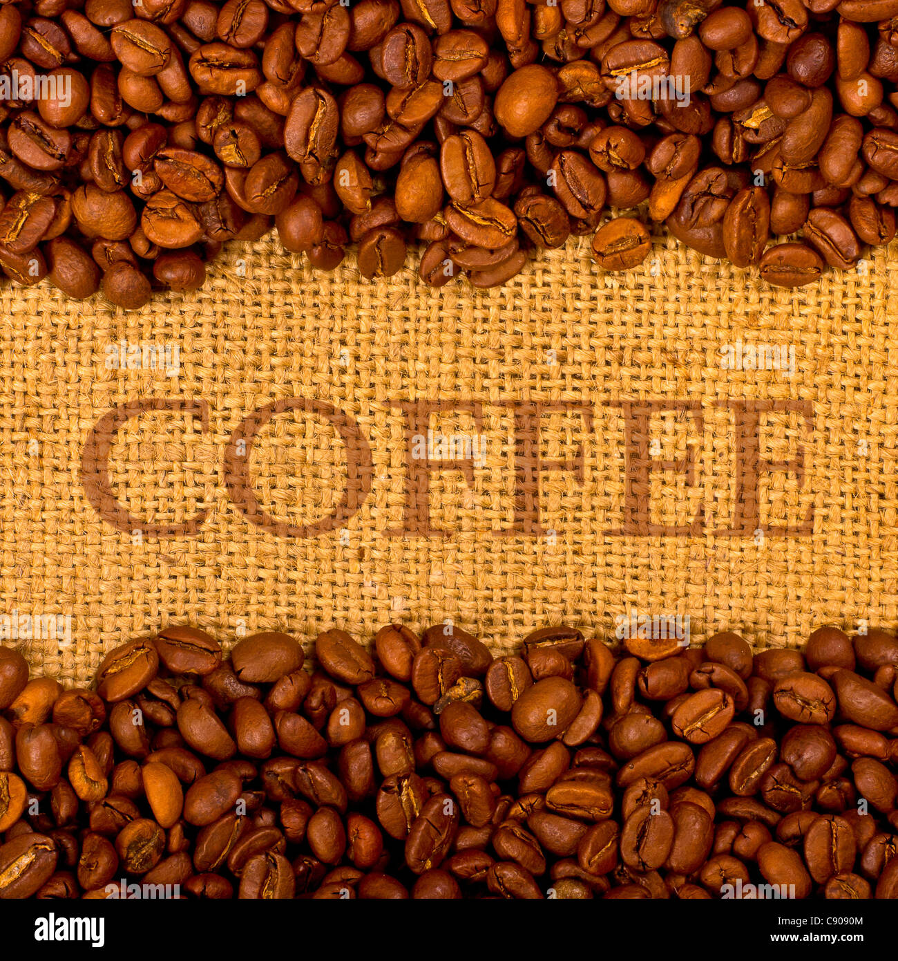 Coffee grains on the burlap background with copy space Stock Photo - Alamy