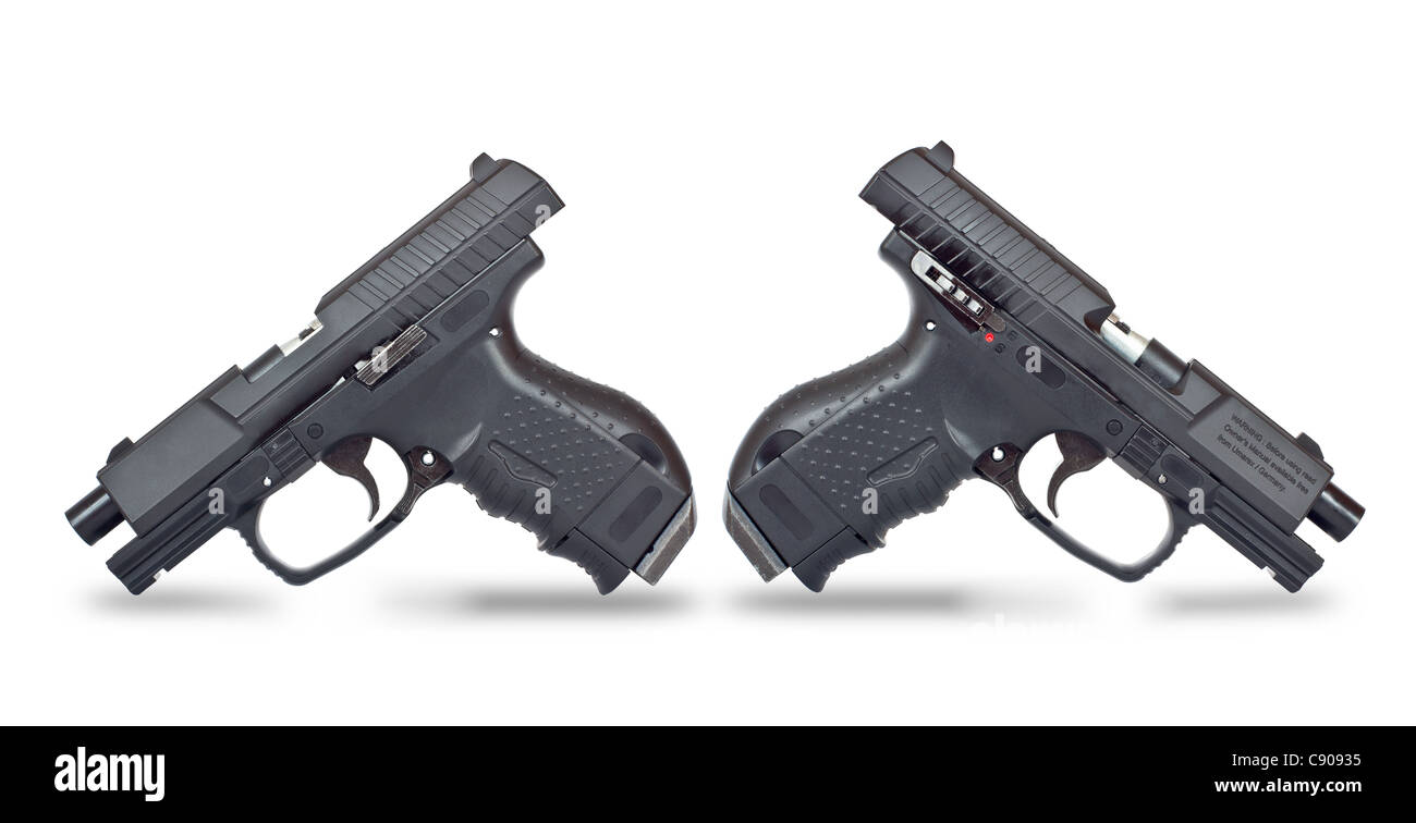 Two black pistol on a white background Stock Photo - Alamy