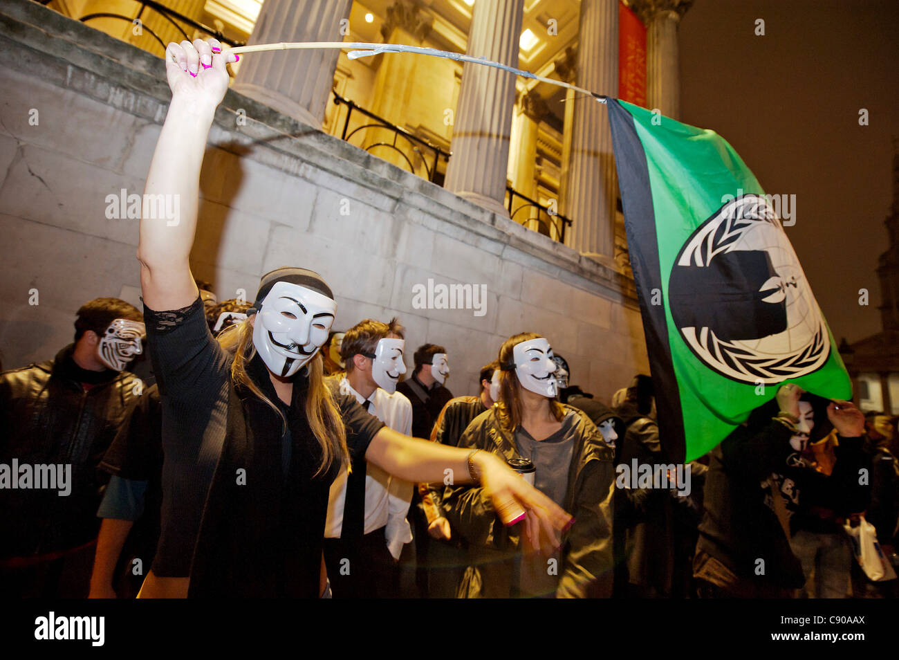 Followers of Anonymous UK arrive in Trafalgar Square sporting V for ...