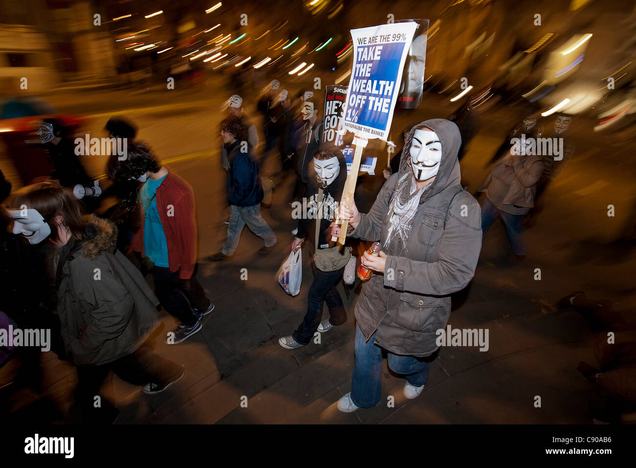 Followers of Anonymous UK arrive in Trafalgar Square sporting V for ...