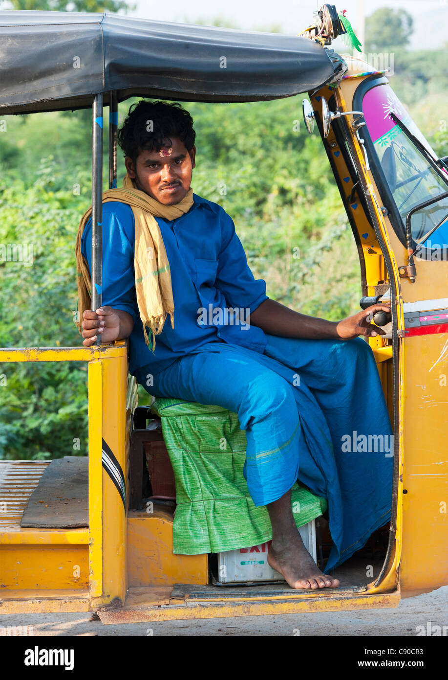 Indian auto rickshaw driver wearing blue. Andhra Pradesh, India Stock ...