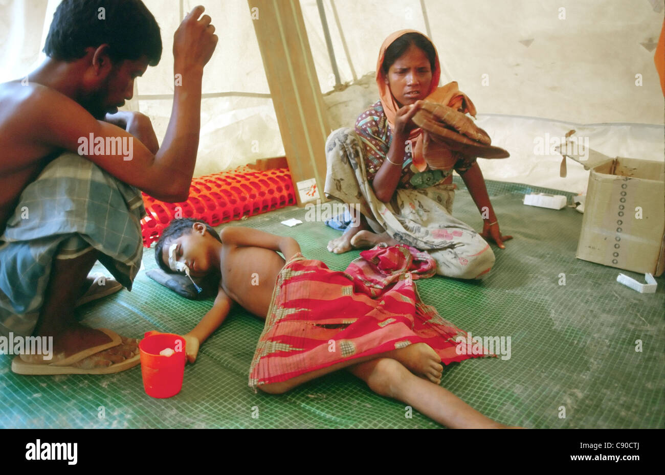Refugee asian medical camp hi-res stock photography and images - Alamy