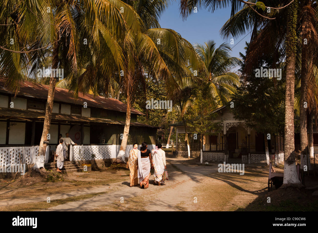 India, Assam, Majuli Island, Hindu women in saris, walking to Satra ...