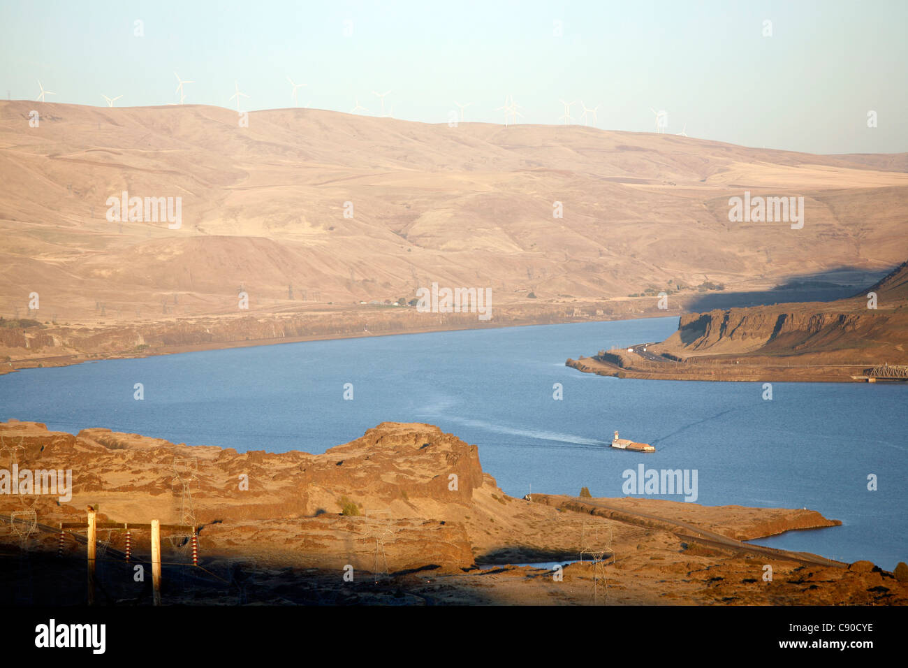 Columbia River from the Washington State side. Barge hauling cargo down ...