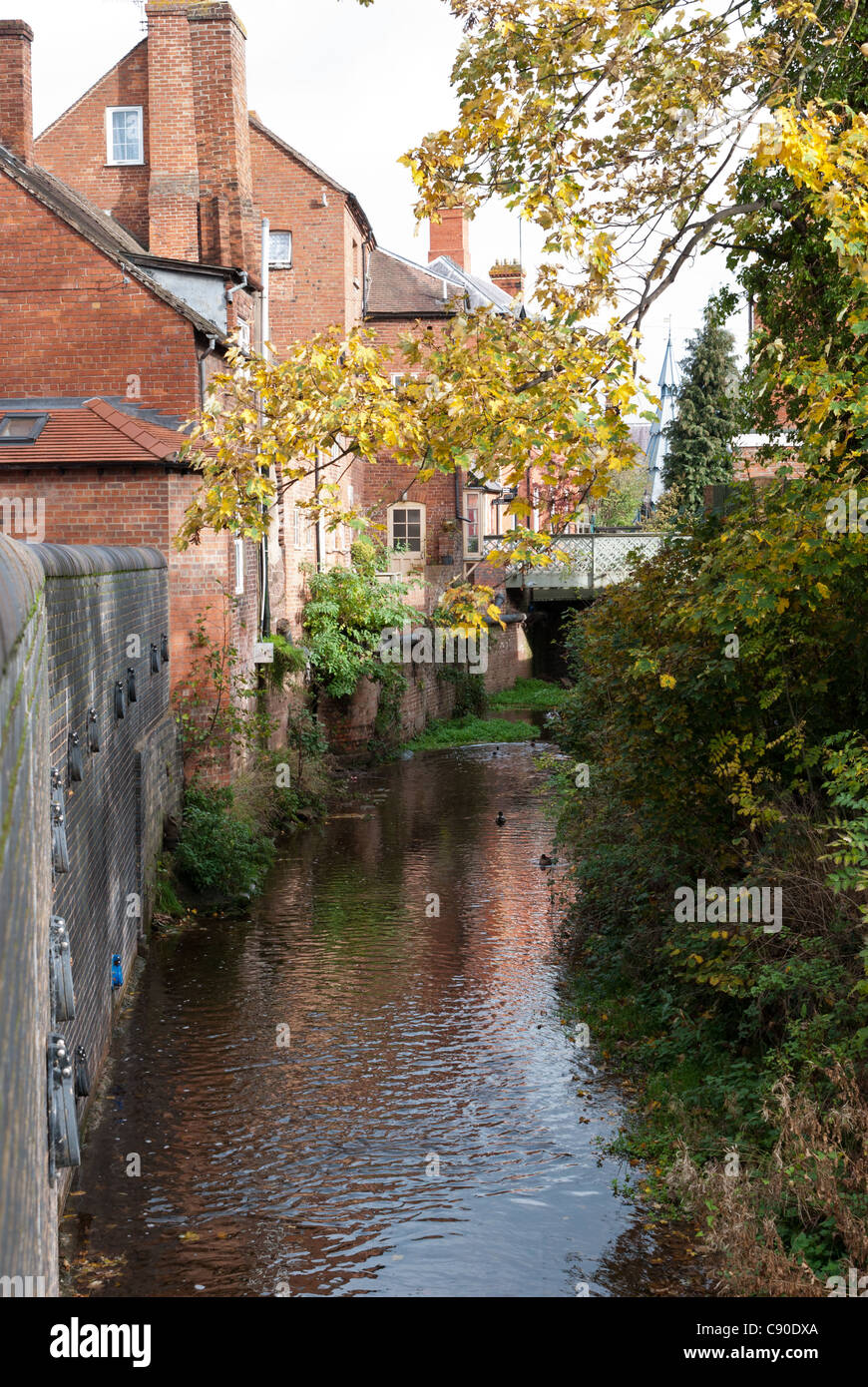 A stream runs past the back of houses in Tenbury Wells in ...