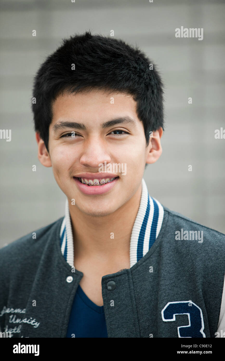 Young man wearing baseball jacket, portrait Stock Photo - Alamy
