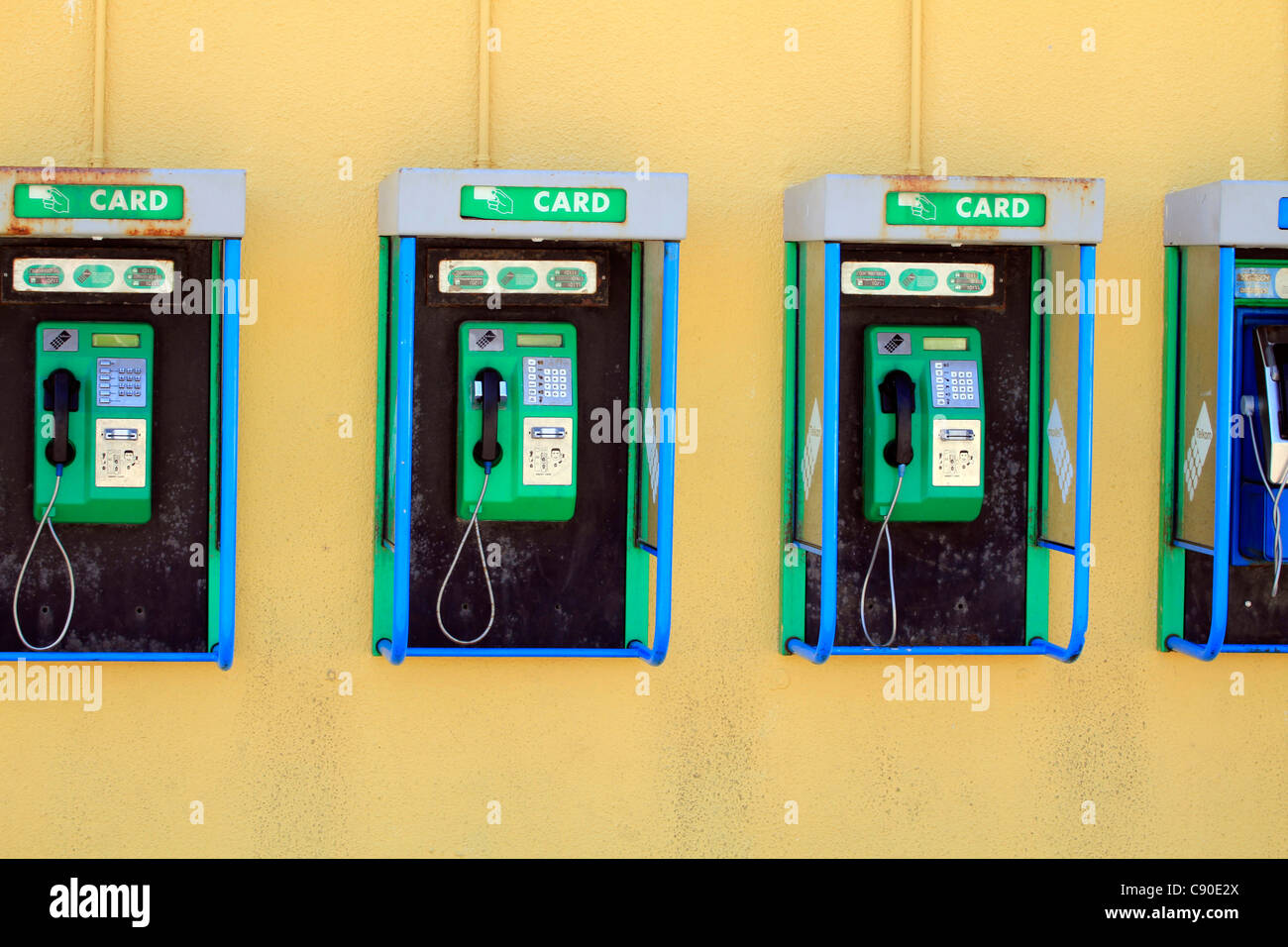 Row of pay phones on a wall at Hout Bay Harbour, South Africa Stock ...