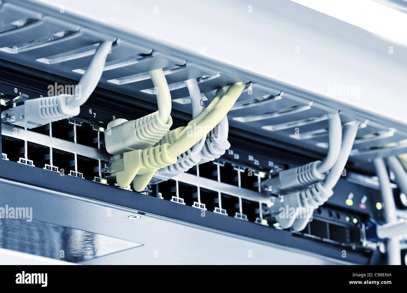 Network RJ-45 connection to switch in technology center Stock Photo - Alamy