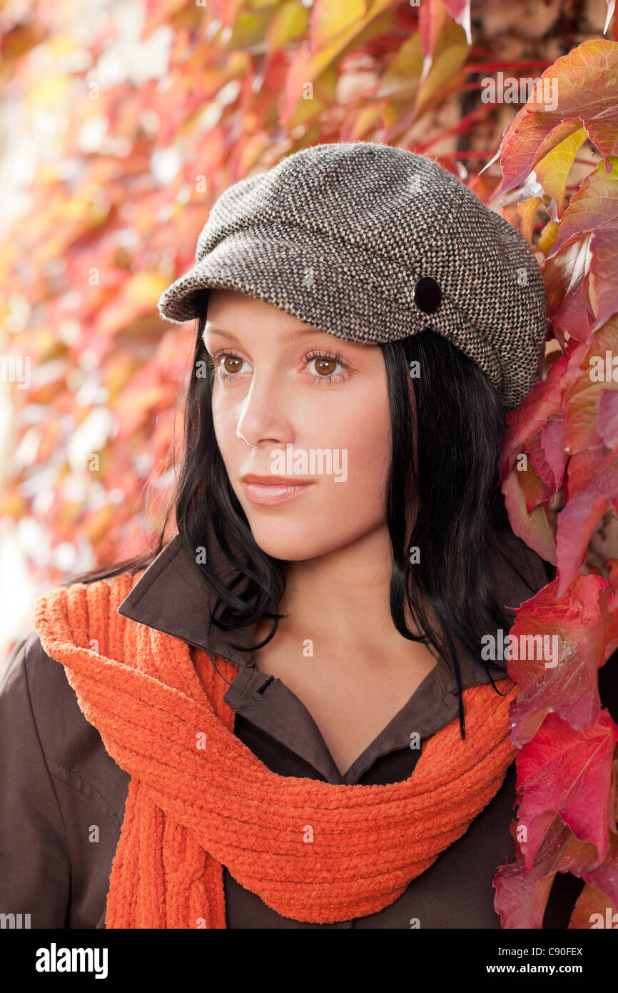 Autumn leaves portrait of beautiful female model posing fashion outfit ...