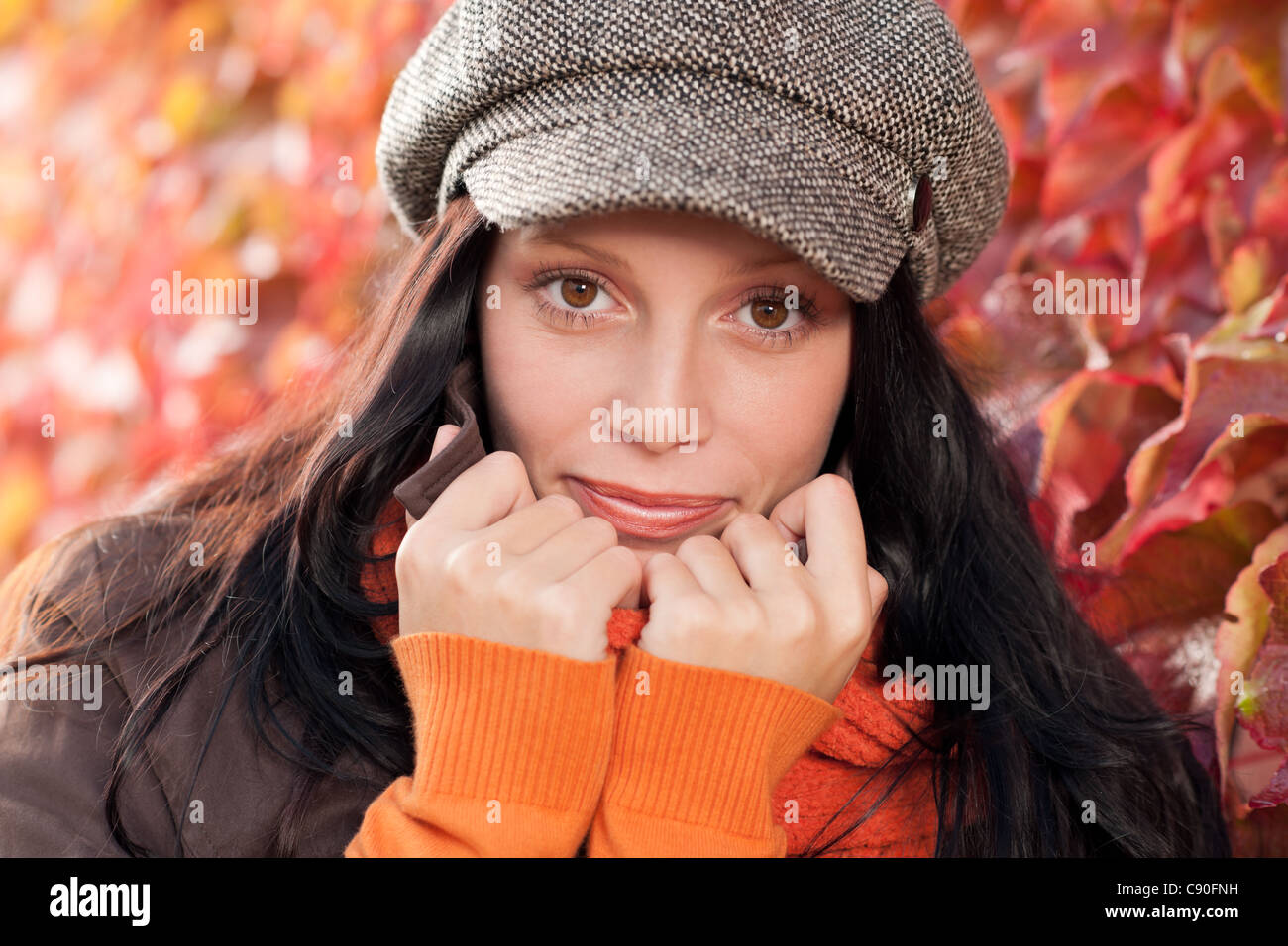 Autumn leaves portrait of beautiful female model posing fashion outfit ...