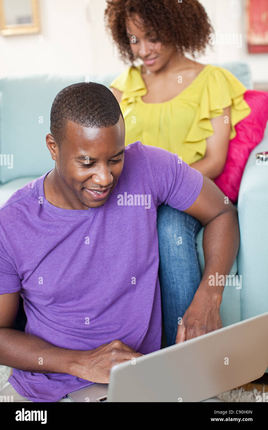 Man using laptop Stock Photo - Alamy