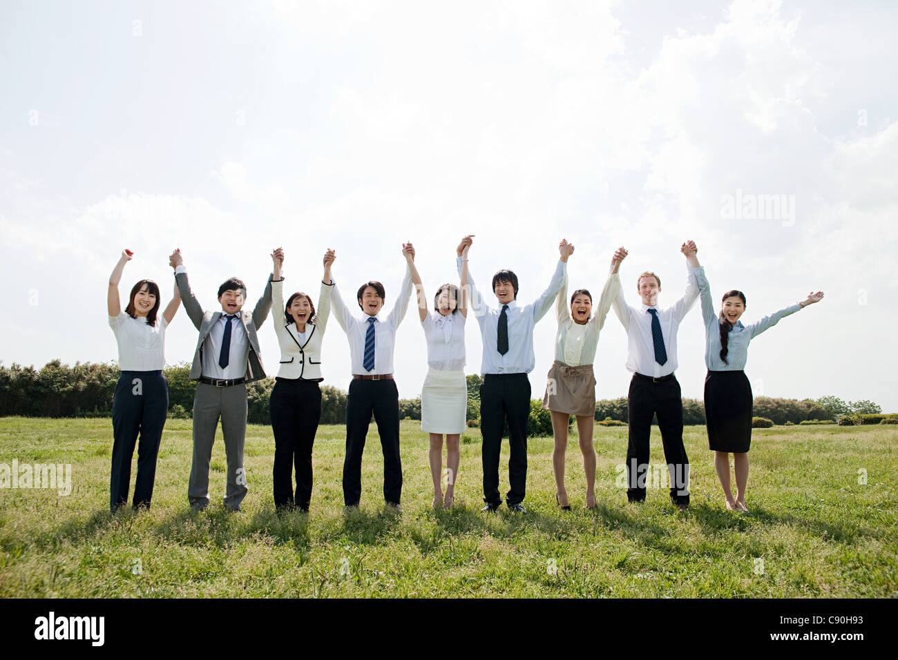 Arms raised asia hi-res stock photography and images - Alamy