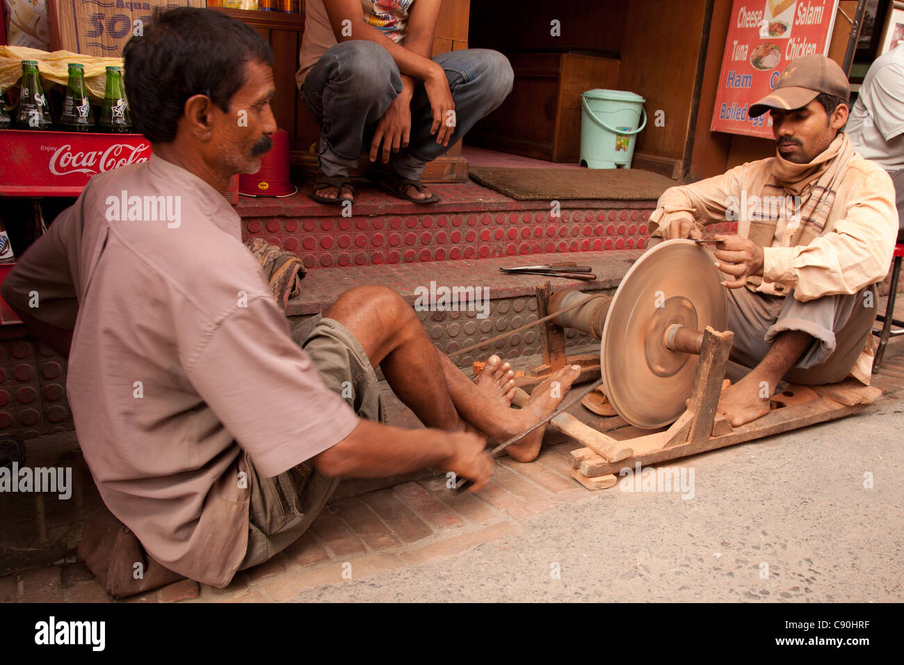 Men sharpening knives, Thamel, Kathmandu, Nepal Stock Photo - Alamy