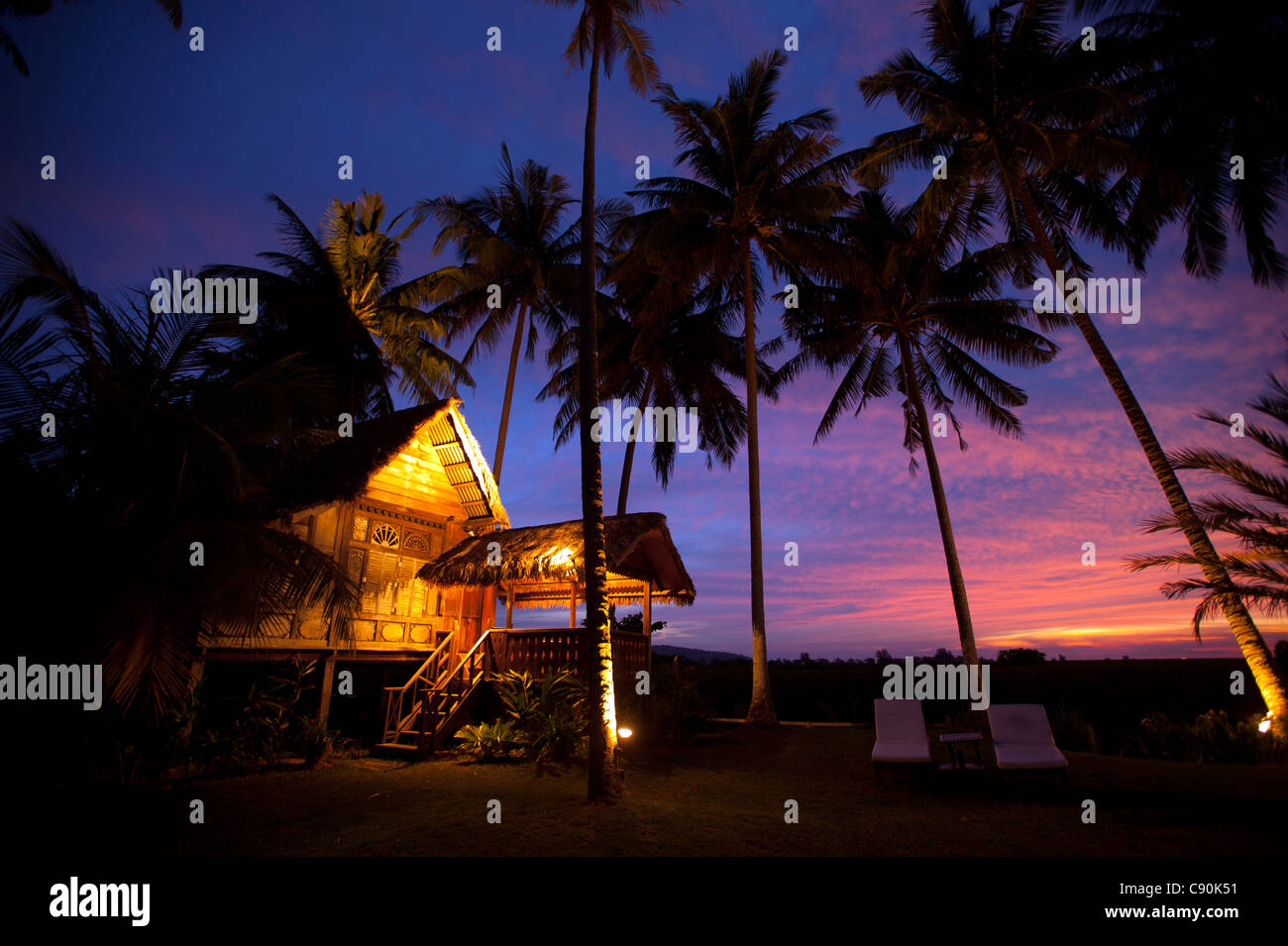 Traditional Malay house in the evening, Bon Ton Resort, Lankawi Island ...