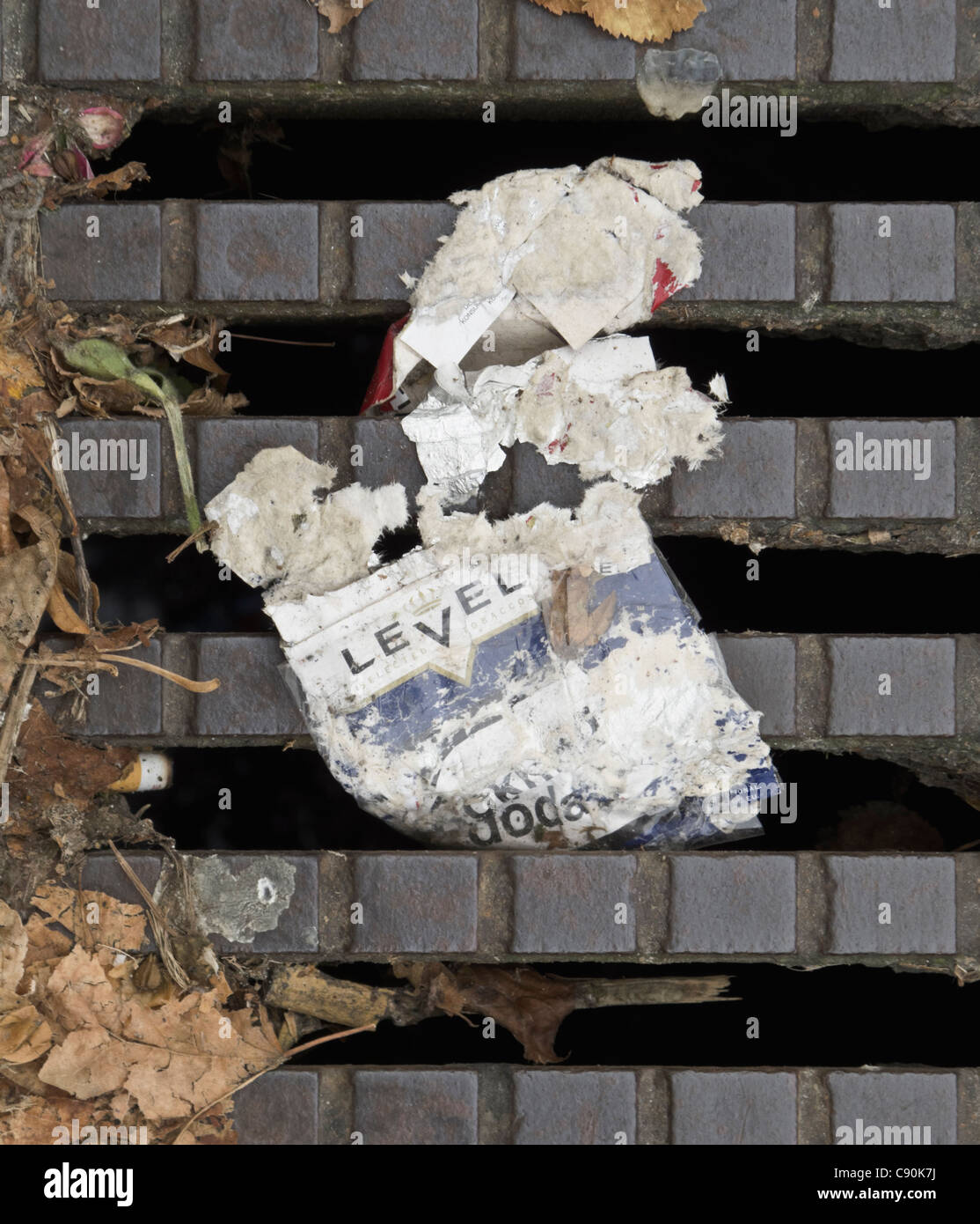 Worn empty Level cigarette packet on the ground. FOR EDITORIAL USE ONLY ...