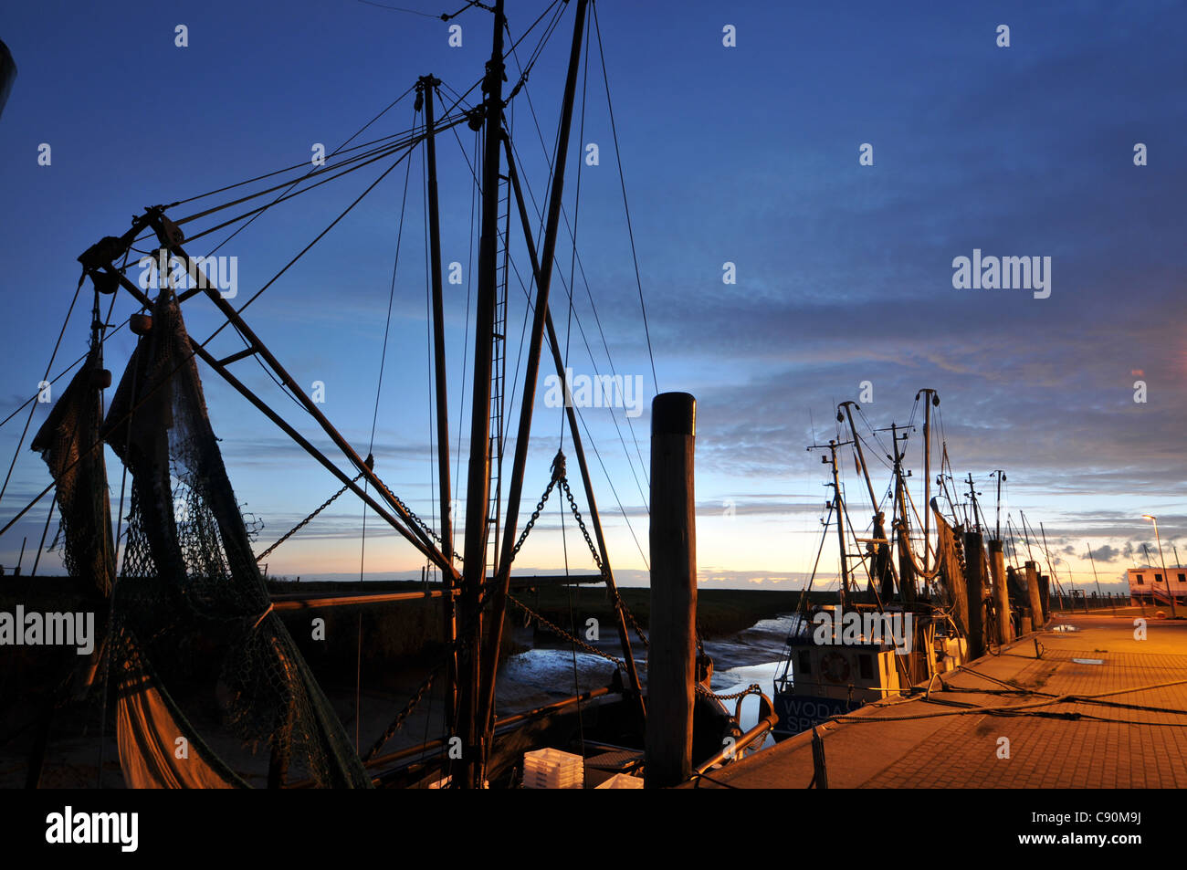 Shrimp trawlers in the harbour, Spieka near Nordholz, North Sea coast ...