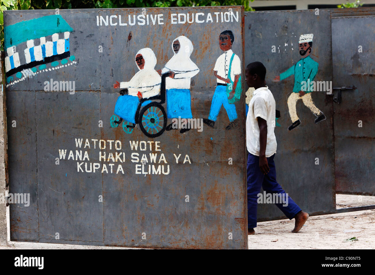 Child going through the school gate in Jambiani, Zanzibar, Tanzania ...
