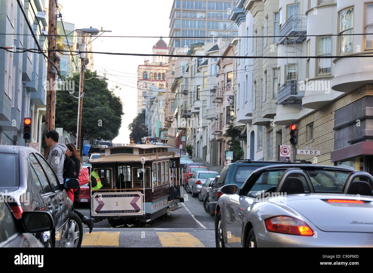 Cable car and cars in a steep street, San Francisco, California, USA ...