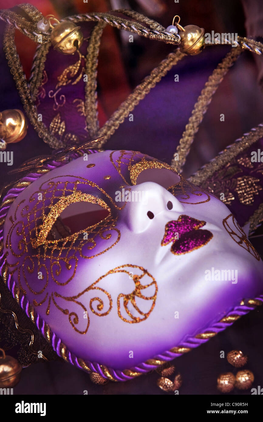 Masquerade mask in a shop window in France Stock Photo - Alamy