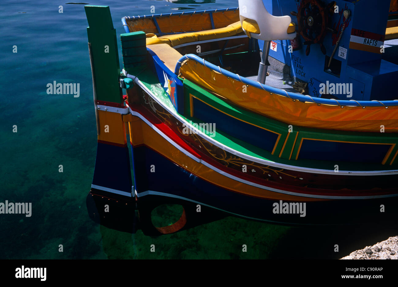 The Luzzu is a traditional wooden fishing boat used by the fishermen of ...