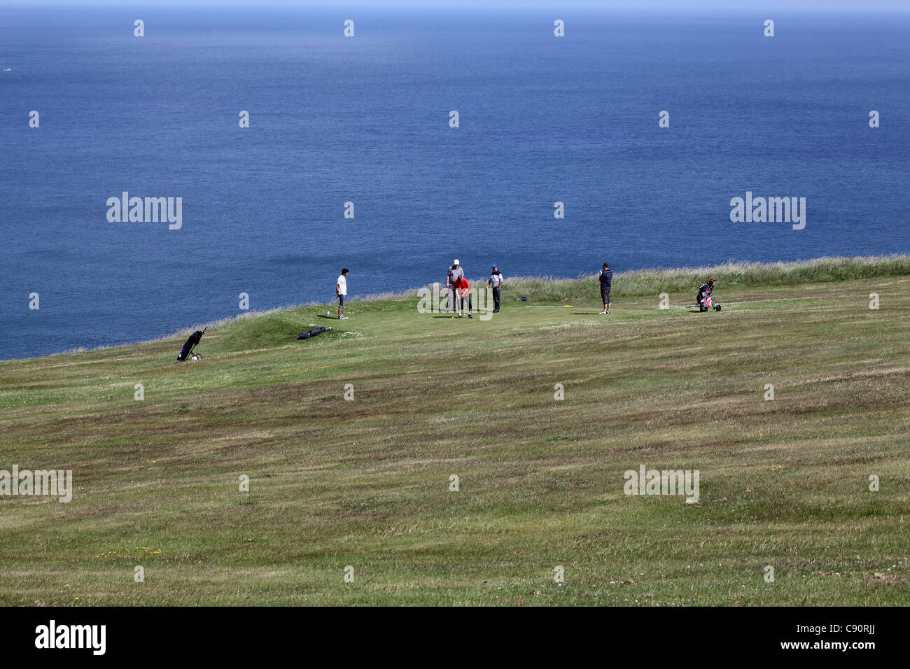 Golfers on the cliff at Ravenscar, East Yorshire Coast, June 2011 Stock ...