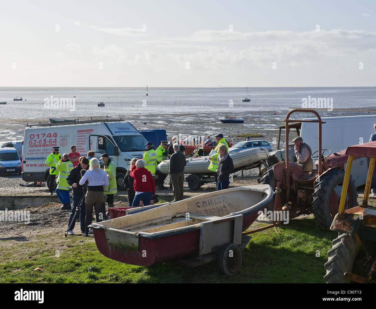Officers from HM Revenue & Customs and Lancashire Constabulary carrying ...