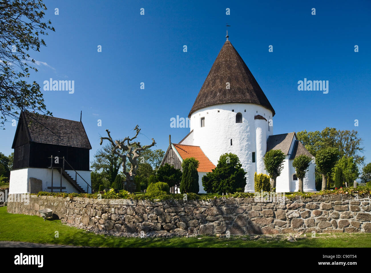 Round church Ols Kirke under blue sky, St. Ols Kirke, Bornholm, Denmark ...
