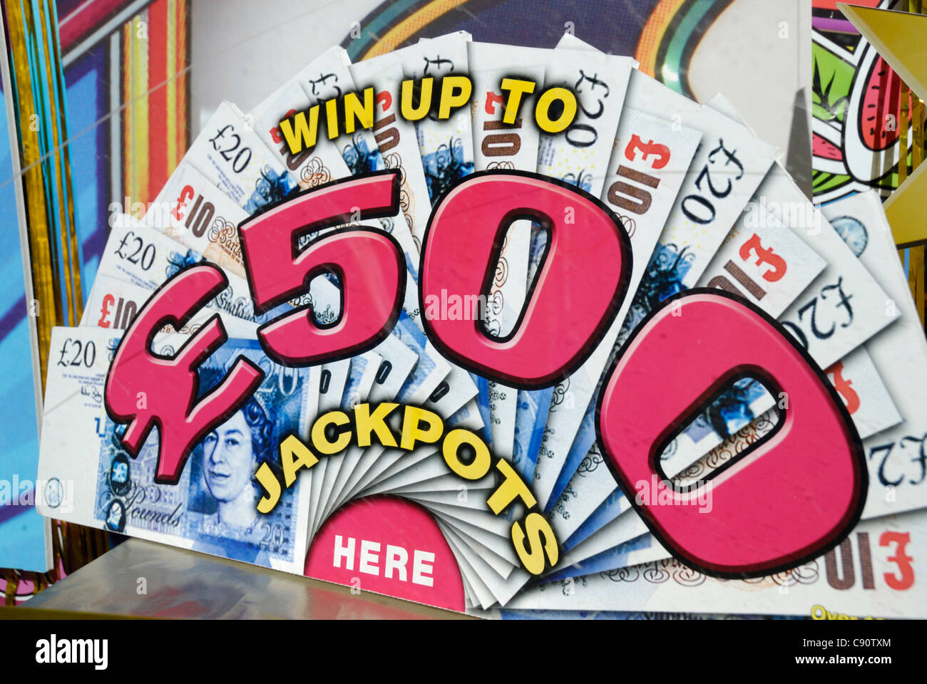 Advertisement for £500 jackpots in an arcade window Stock Photo - Alamy