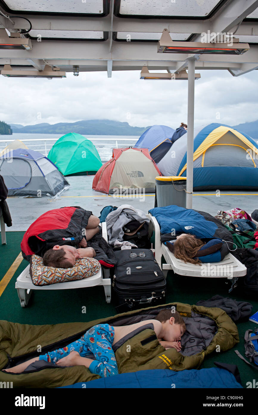 Family sleeping in the solarium. Columbia ferry. Alaska Inside Passage ...
