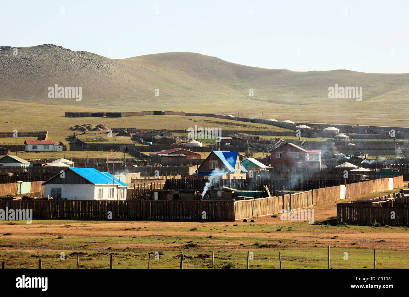 The northern Siberian villages are dominated by the mountains or steppe ...