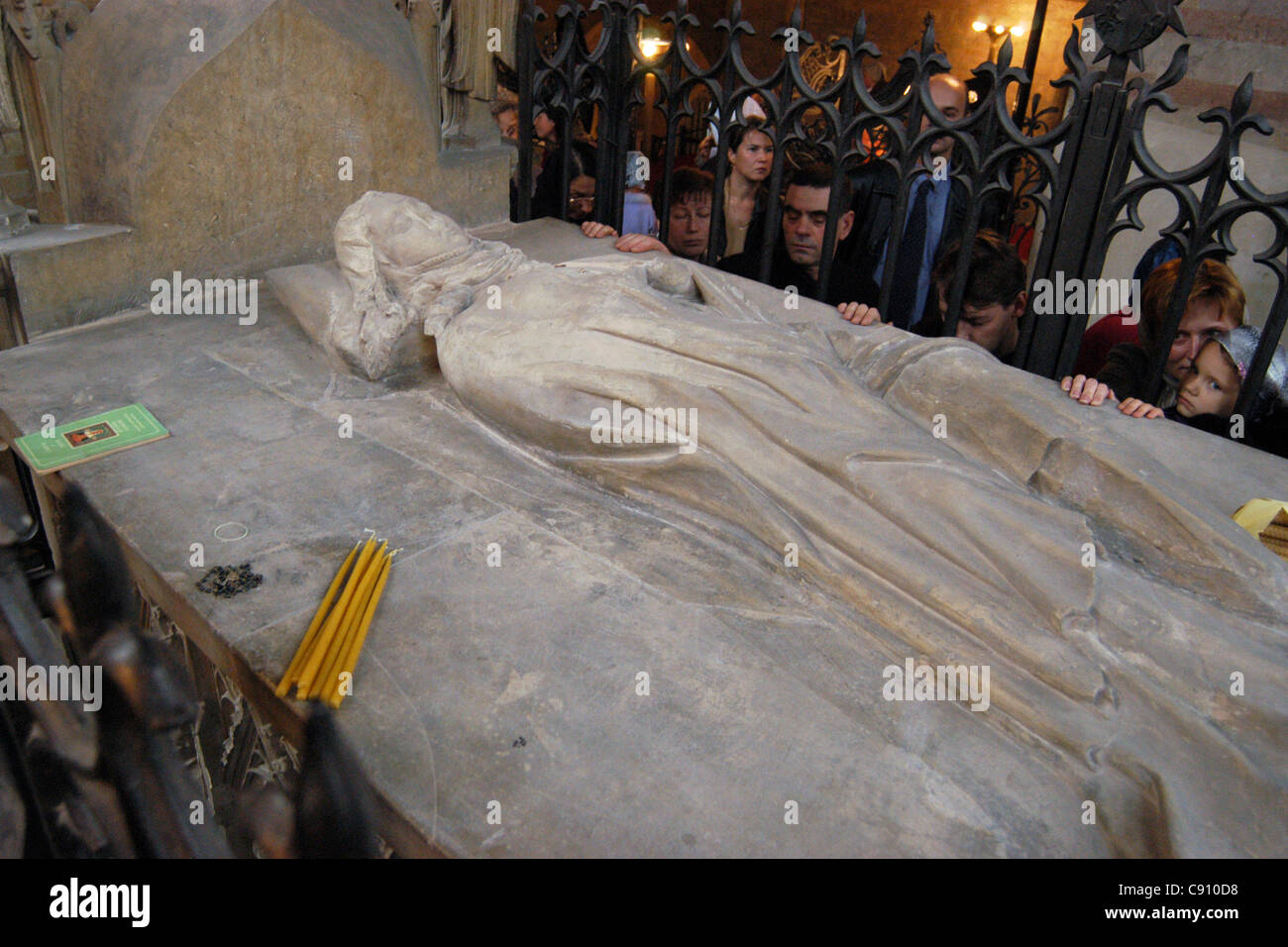 Eastern orthodox believers pray beside the tomb of St Ludmila of ...